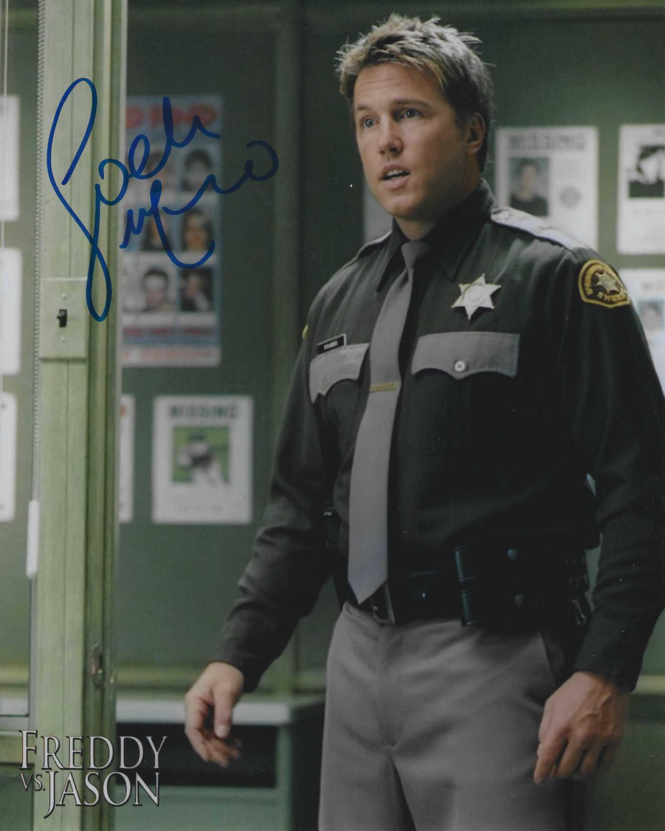 Lochlyn Munro 10x8 signed in Blue Jason V Freddy – Showmasters Comic Con Official Autograph Shop