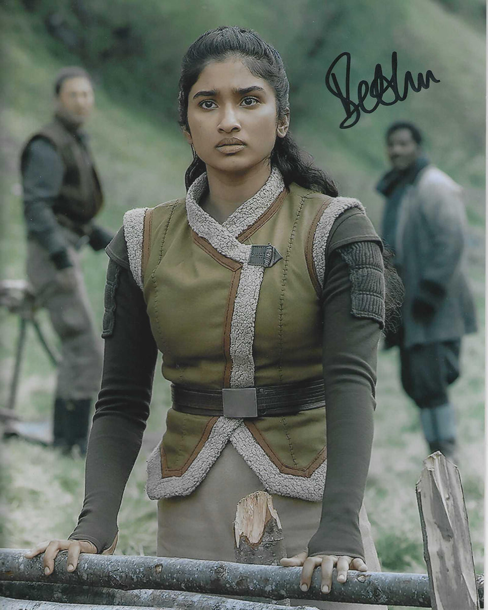 Varada Sethu 10X8 signed in Black Star Wars Andor – Showmasters Comic Con Official Autograph Shop