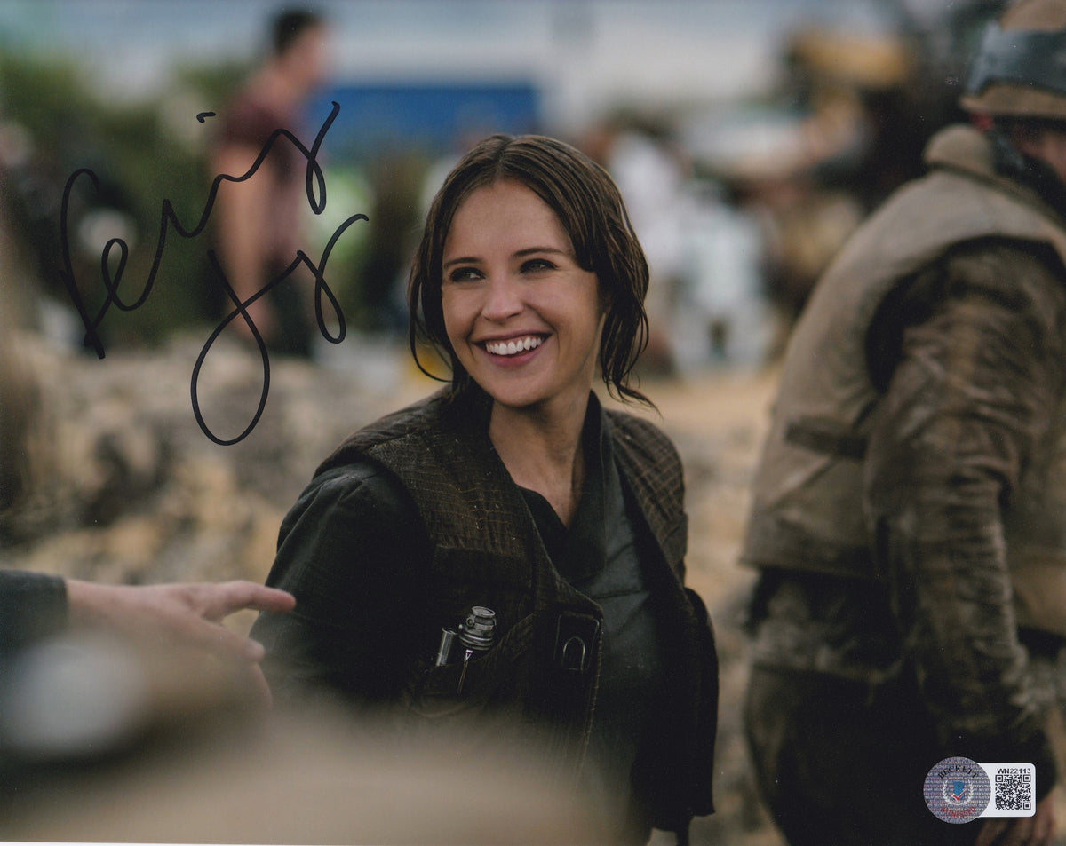 Felicity Jones 10x8 signed in Black Star Wars Rogue One already with b ...